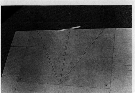 Plexiglass Board With Lines Marked In Increments Of 12 Inch Showing