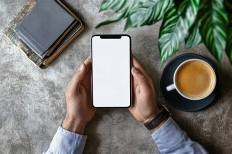 Top View Of Male Office Worker Using Mock Up Smartphone While Take A