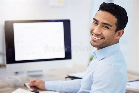 Build An Inspiring Work Environment A Young Businessman Working At His Desk Stock Image