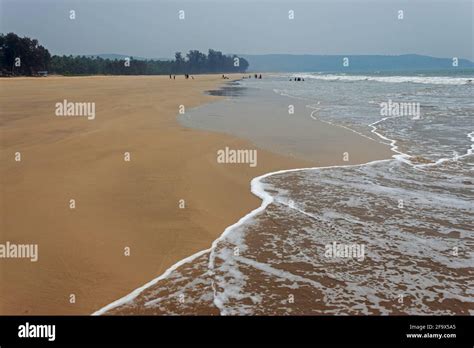 Guhagar Beach View With Small Waves And Large Expanse Of Sand