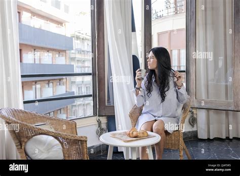 Happy Rich Young Woman Wear Night Robe Stand At Big Window Open Lace
