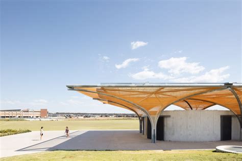 Marsden Park Pavilion In Sydney Is Shaded By A Canopy Of Golden Mesh