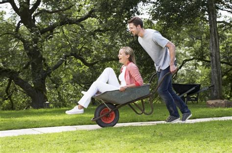 Man Pushing Wheelbarrow Background Images Hd Pictures And Wallpaper