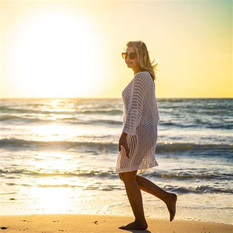 Beach Holiday Beautiful Mature Woman Walking On Sunny Tropical Beach