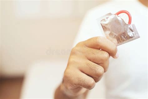 Condom Ready To Use In Male Hand Give Condom Safe Sex Concept Stock Photo Image Of Activity