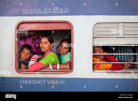 Passengers At The Window Of A Second Class Train Carriage At The
