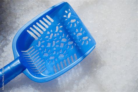 Granular Cat Litter For Toilet With Close Up Scoop Background Toilet
