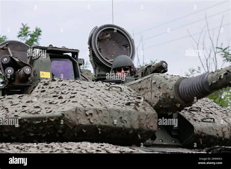 A Ukrainian Soldier On A Swedish Cv90 Infantry Fighting Vehicle At His