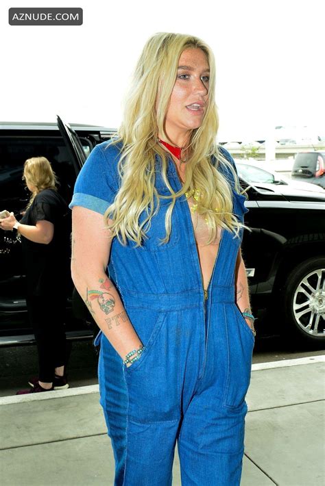Kesha Wears A Lowcut Denim Jumpsuit While Skipping Town Through Lax