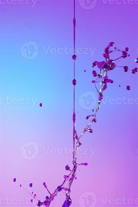 Abstract Background Of A Splash Of Colored Water Collision Of Colored Drops Falling Towards