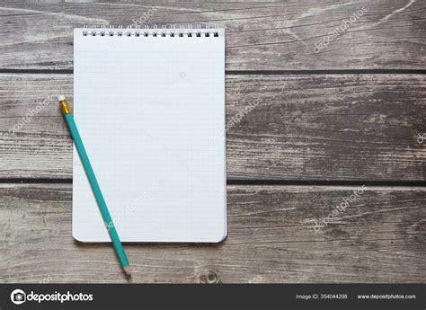 Notepad Blank White Sheet Checker Paper Simple Graphite Pencil Lies Stock Photo By Stasokulov