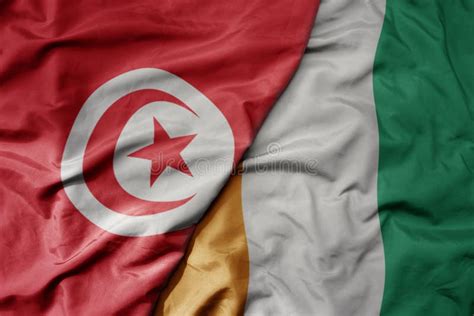 Big Waving National Colorful Flag Of Tunisia And National Flag Of Cote