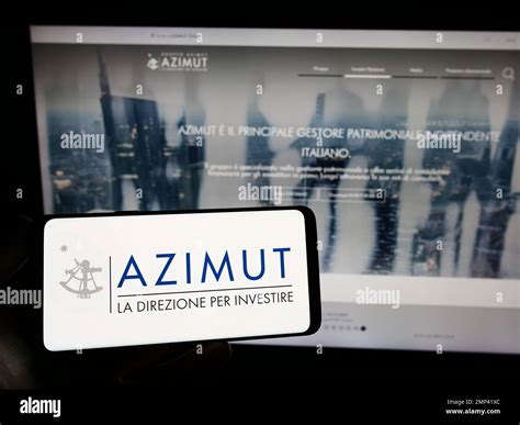 Person Holding Smartphone With Logo Of Asset Management Company Azimut