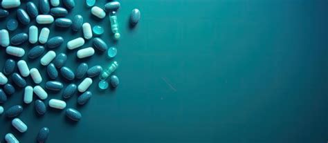 Complex Multivitamin Supplement Capsules On A Blue Green Background A