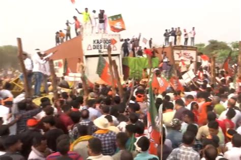 Police Use Water Cannons Fire Tear Gas On Bjp Workers Gathered Outside