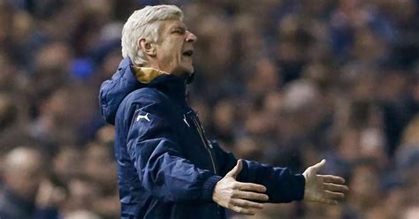 Arsene Wenger Vs Arsene Wengers Coat Footballs Longest Running Feud