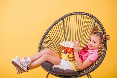 Free Photo Cute Girl Eating Popcorn