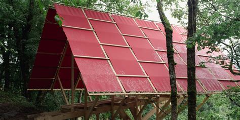 Oversized Red Roof Shelters Patagonian Shadow Cabin In France