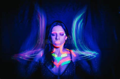 Model Woman In Neon Light Beautiful Model Girl With Fluorescent Makeup Art Design Of Disco