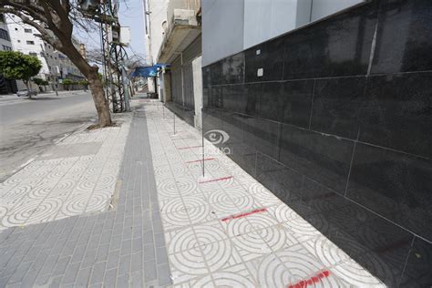 شاهد الصور بدء إجراءات الوقاية من كورونا في بنوك البريد بغزة وكالة