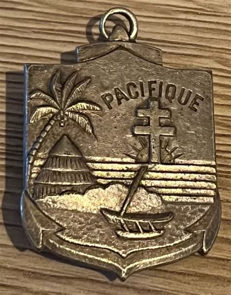 INSIGNE MILITAIRE PUCELLE Régiment dinfanterie de marine du Pacifique