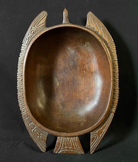 A Massim Carved Bowl Featuring A Frigate Bird Design Trobriand