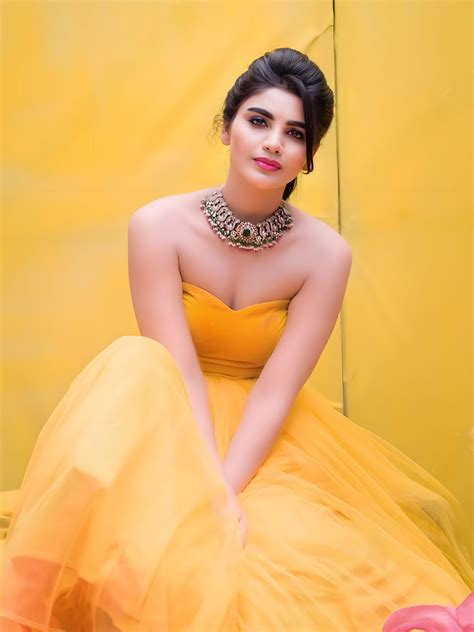Jabardasth Varsha In Yellow Gown Photoshoot South Indian Actress