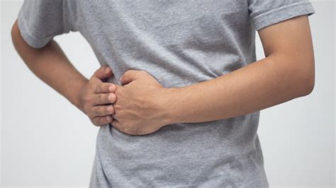 Mujer Con Dolor En El Lado Derecho Del Cuerpo Foto De Stock Y Más Banco