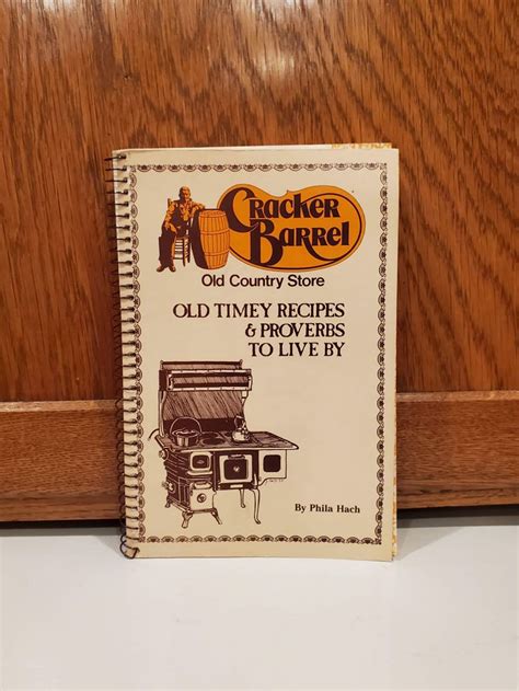 An Old Timey Recipe Book Sits On The Counter