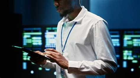 Premium Photo Engineer Checking Blade Servers