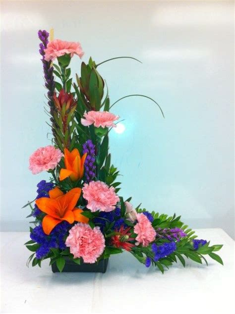 20 Best Triangular Floral Arrangements Images On Pinterest Floral