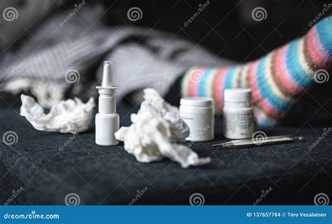 Cold Medicine And Thermometer On A Blue Background Royalty Free Stock