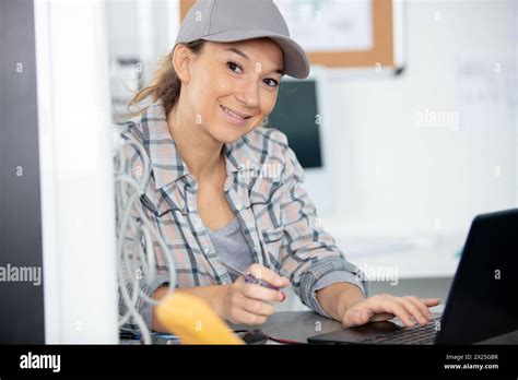 Female Programmer Coding On A Desktop Computer Stock Photo Alamy