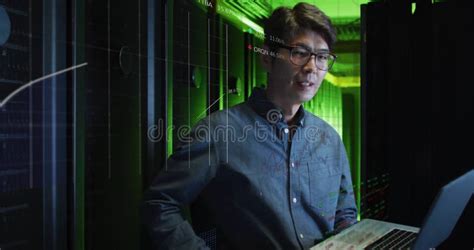 Animation Of Data Processing Over Asian Male It Engineer By Computer