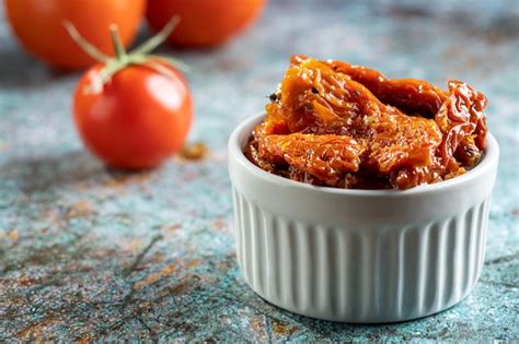 Premium Photo Sun Dried Tomatoes With Herbs