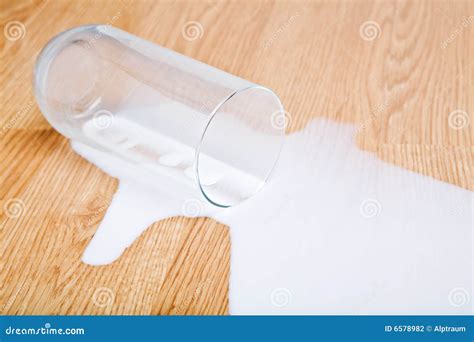 Spilled Milk Overturned Glass With Milk On Blue Background Dairy