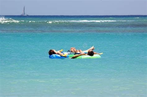 Lazy Day In The Water Editorial Stock Image Image Of Couple 143699