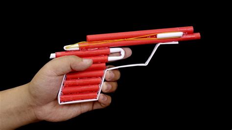 How To Make A Paper Gun That Shoots Youtube