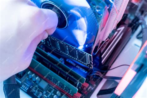 Premium Photo The Inserting Plug In The Ram Ddr Memory Card In The