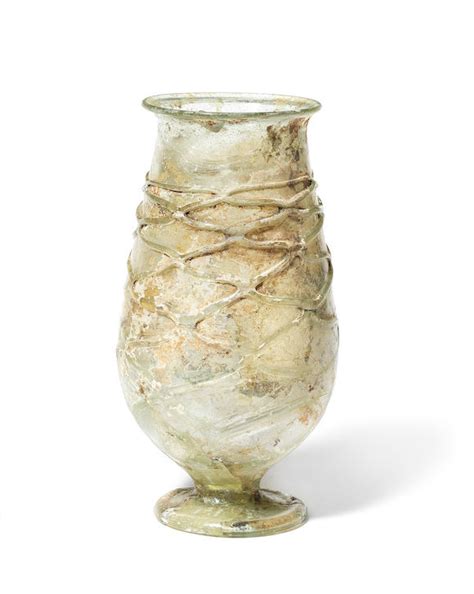 Bonhams A Large Gallo Roman Pale Green Glass Footed Goblet With