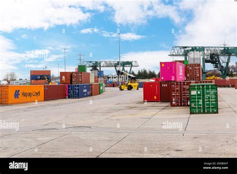 A Top Loader Vehicle Moves And Stacks Intermodal Shipping Containers At