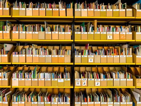 Libary Rack With Many Small Books Sorted In Small Folder Stock Image