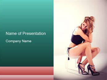 Captivating Babe Woman In Black Lingerie Poses Seductively On A White Chair Vertical Shot