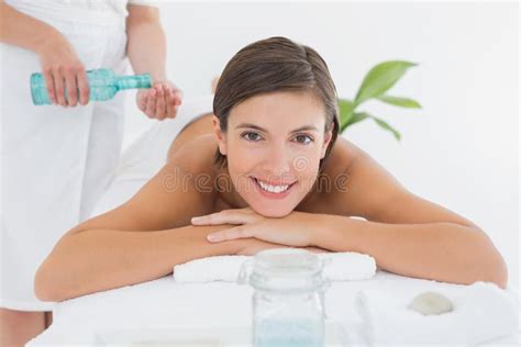 Attractive Woman Getting Massage Oil On Her Back Stock Image Image Of