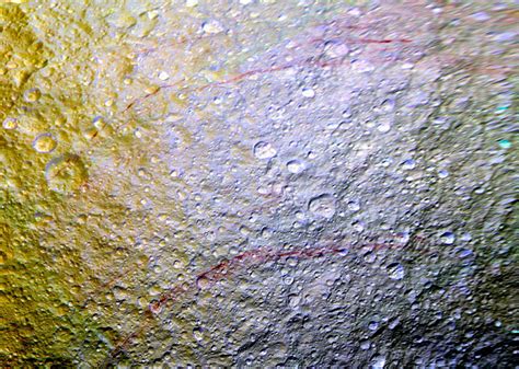 This Enhanced Color Mosaic Of Saturns Icy Moon Tethys Shows A Range Of