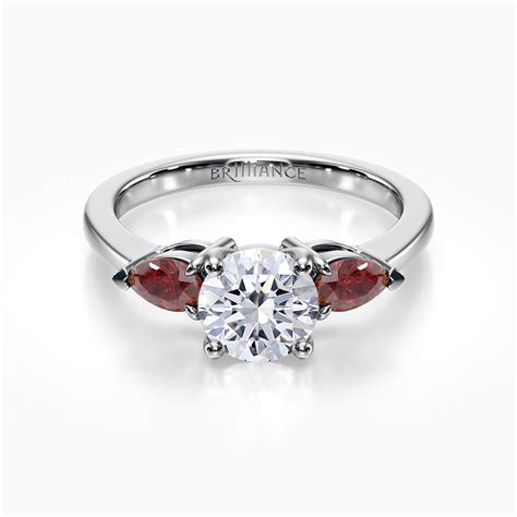 Pear Shaped Ruby 3 Stone Engagement Ring In Platinum