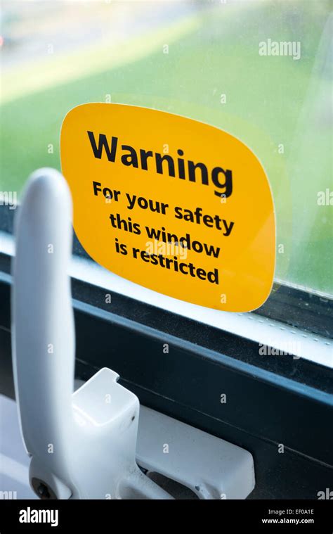 Warning Sticker On Restricted Window Stock Photo Alamy