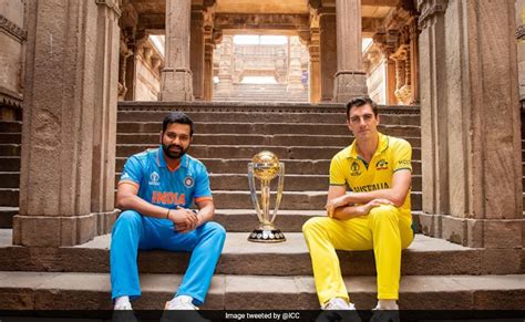India Vs Australia Rohit Sharma And Pat Cummins Pose With The Trophy