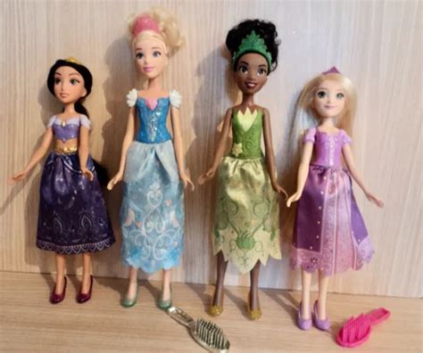 Disney Lot Jasmine Cinderella Rapunzel And Tiana Dressed Dolls And