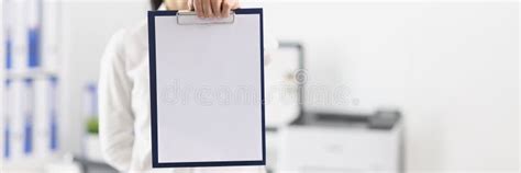 Woman In The Office Shows A Folder With A Document Mock Up Stock Image Image Of Coach Office